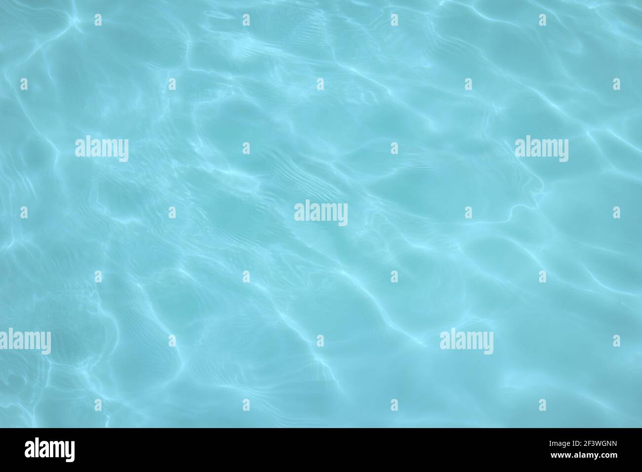 swimming pool with sunny reflections background Stock Photo - Alamy