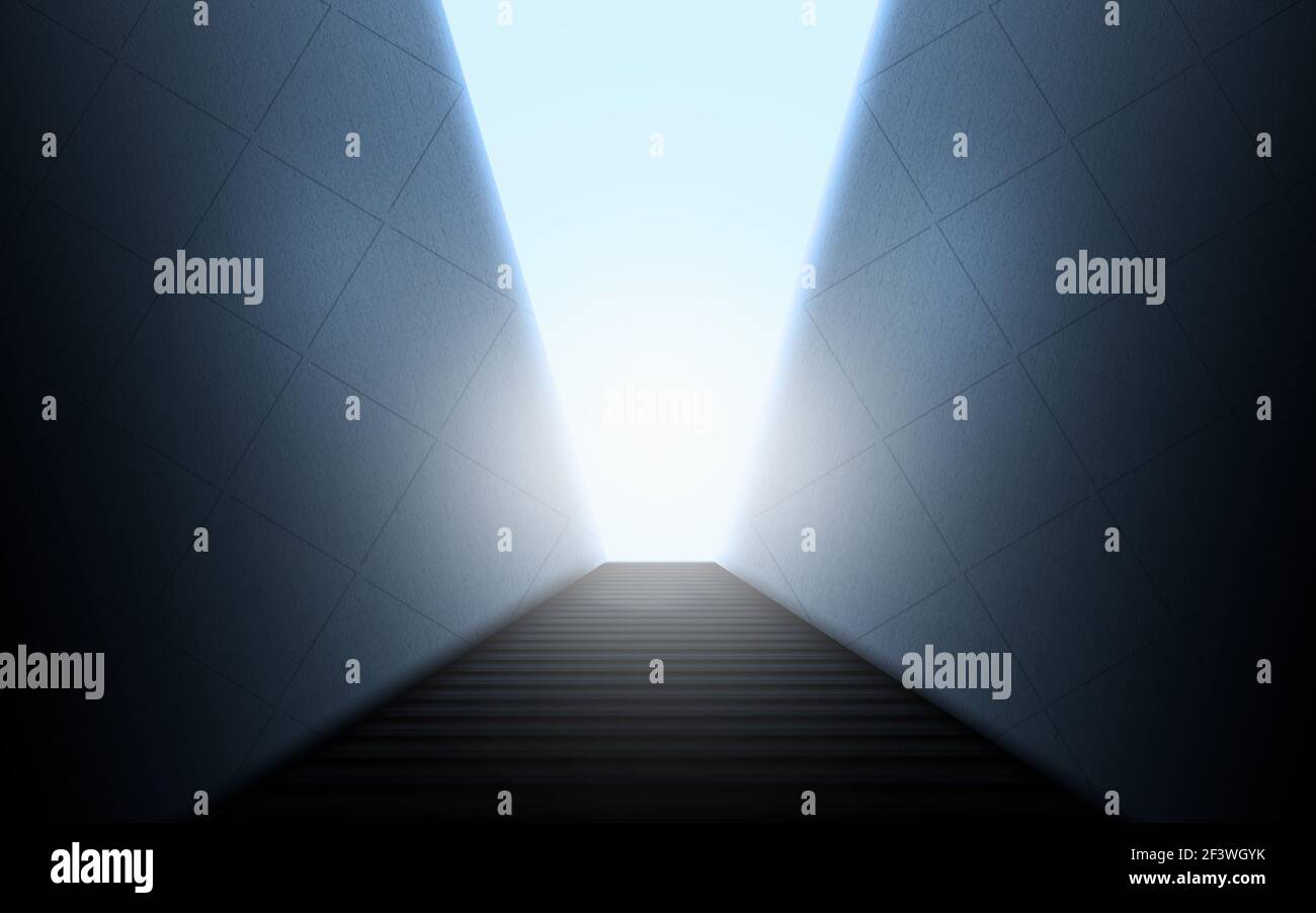 Light through a big stairway with huge geometric wall. building ...