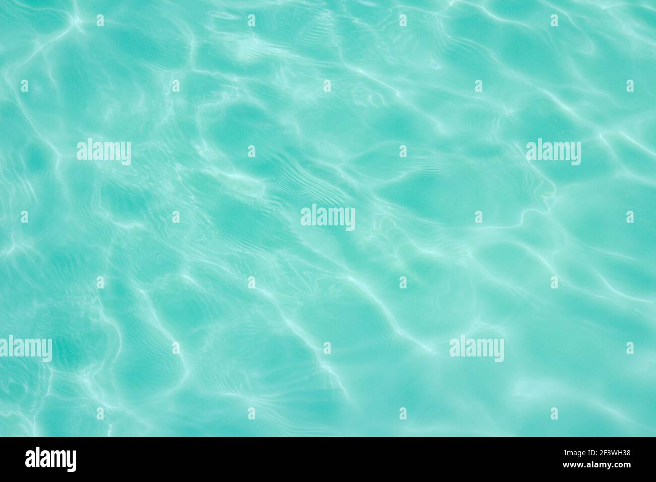 swimming pool with sunny reflections background Stock Photo - Alamy