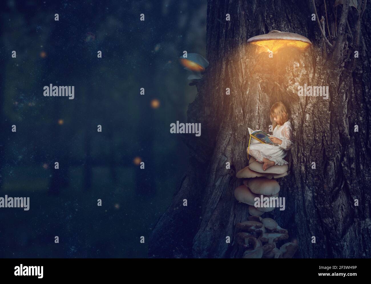 Enchanted forest - little girl sitting under the glowing mushroom ...