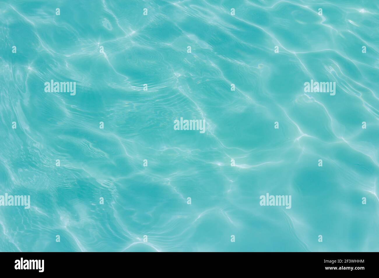 swimming pool with sunny reflections background Stock Photo - Alamy