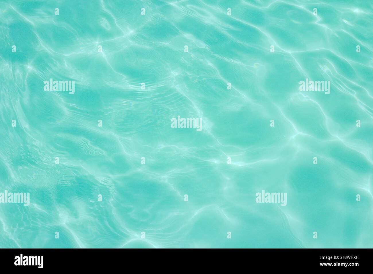 swimming pool with sunny reflections background Stock Photo - Alamy