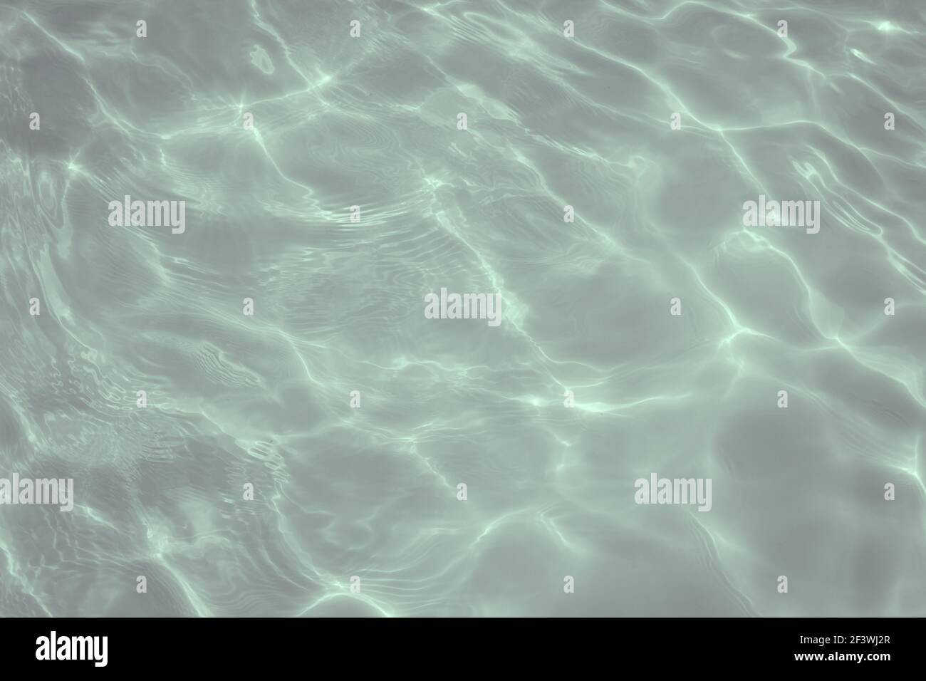 swimming pool with sunny reflections background Stock Photo - Alamy