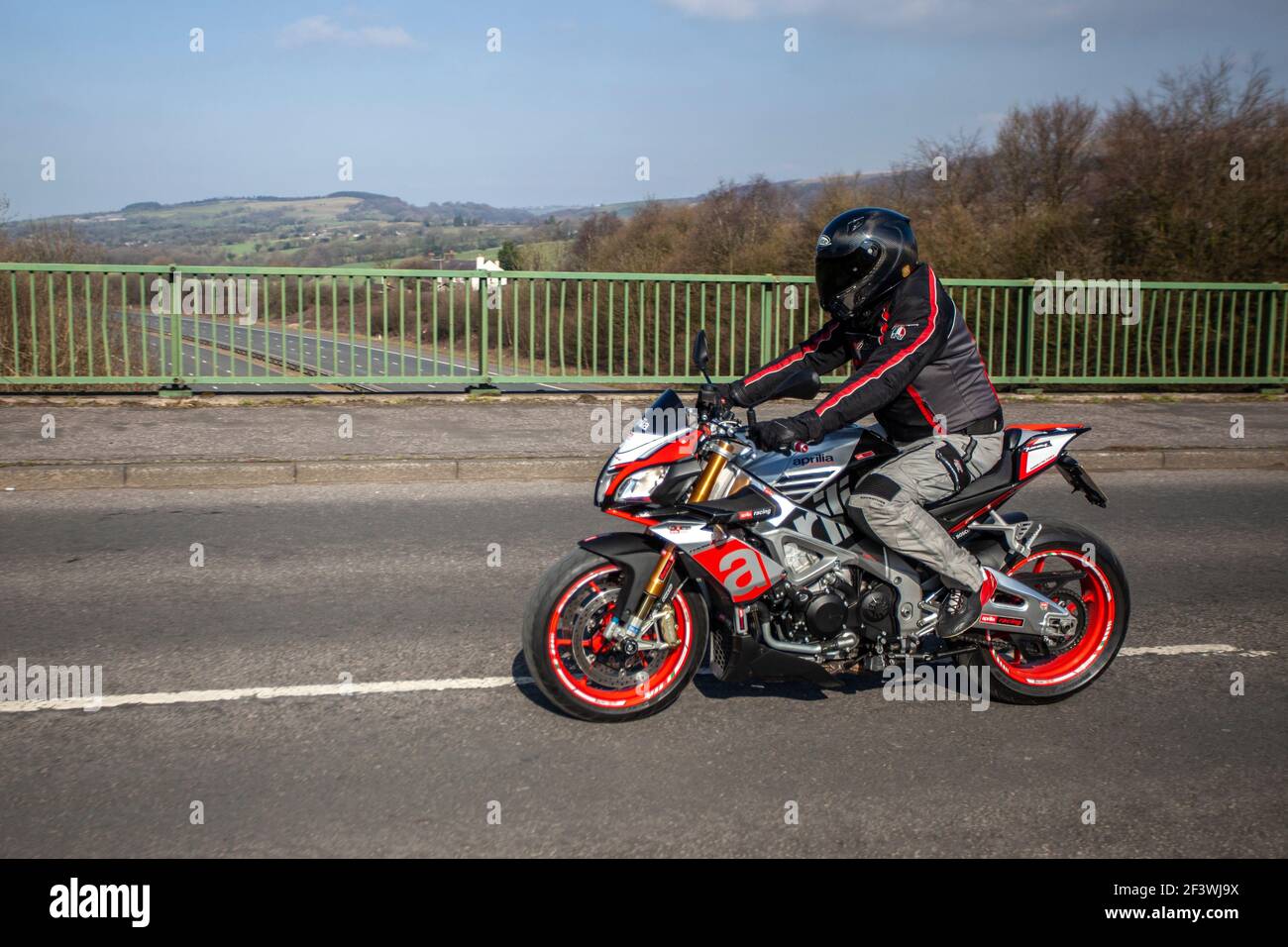 Aprilia Racing Tuono V4 Factory 1100; Motorbike rider; two wheeled ...