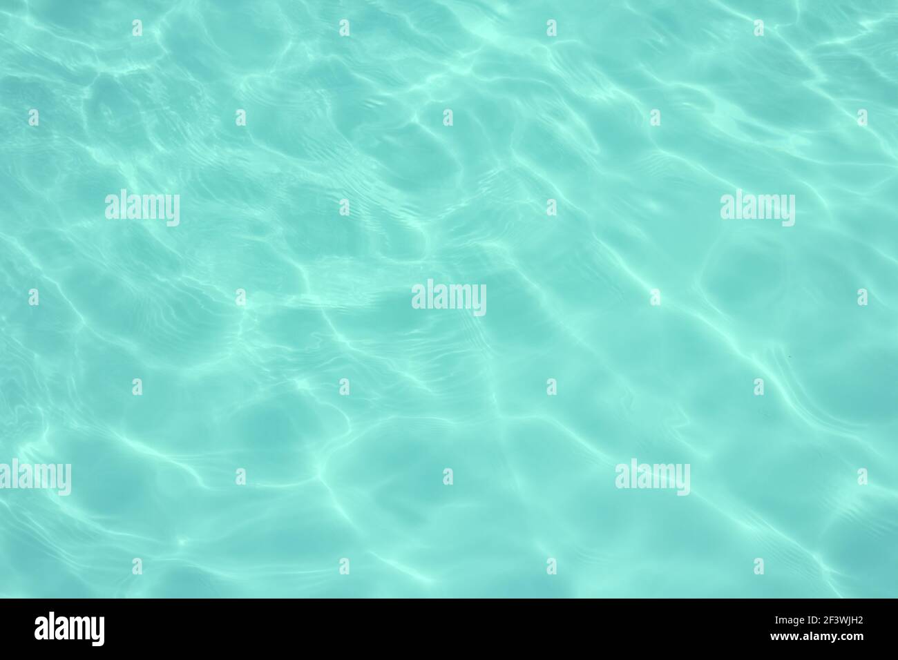 swimming pool with sunny reflections background Stock Photo - Alamy