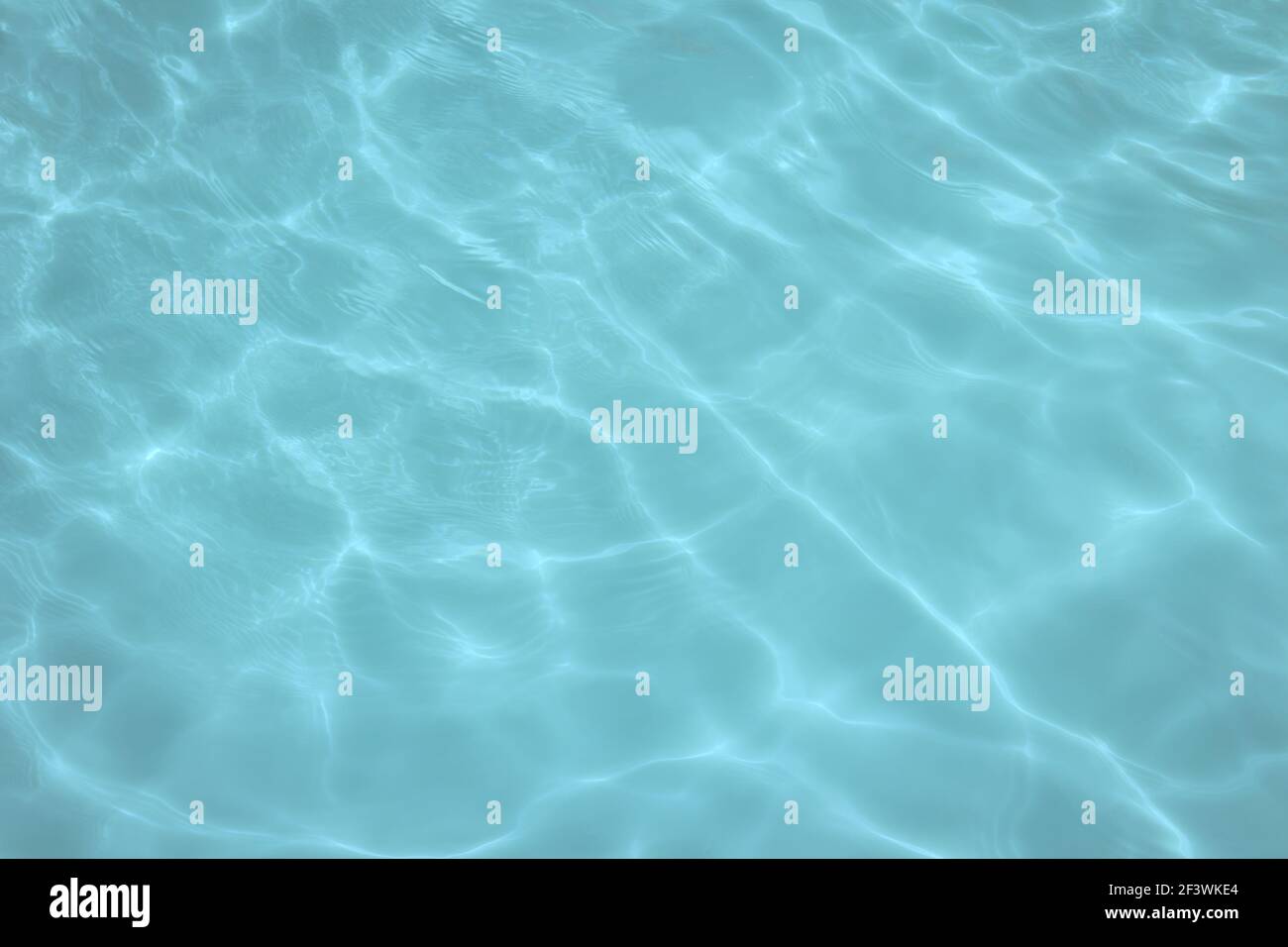 swimming pool with sunny reflections background Stock Photo - Alamy
