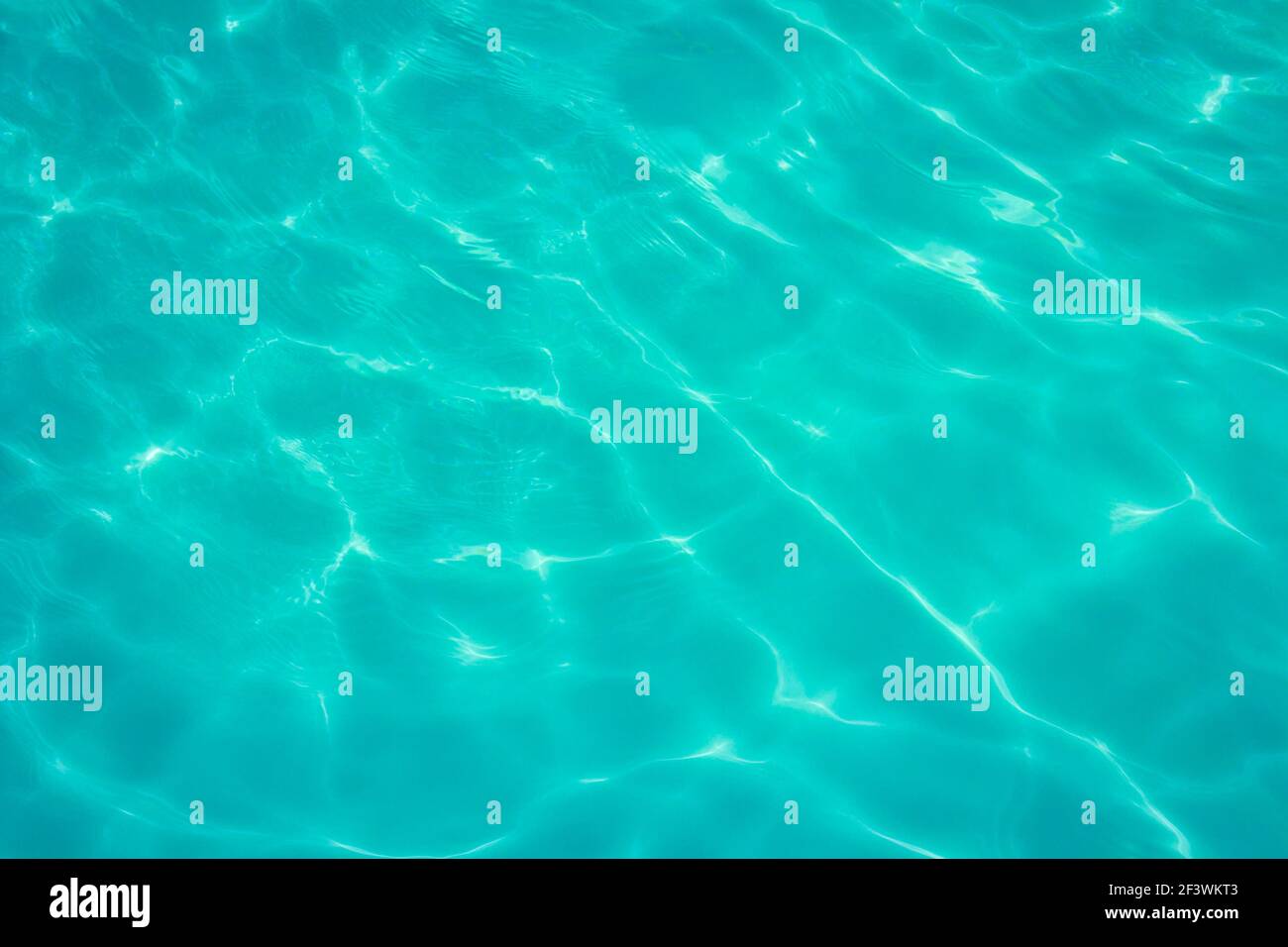 swimming pool with sunny reflections background Stock Photo - Alamy