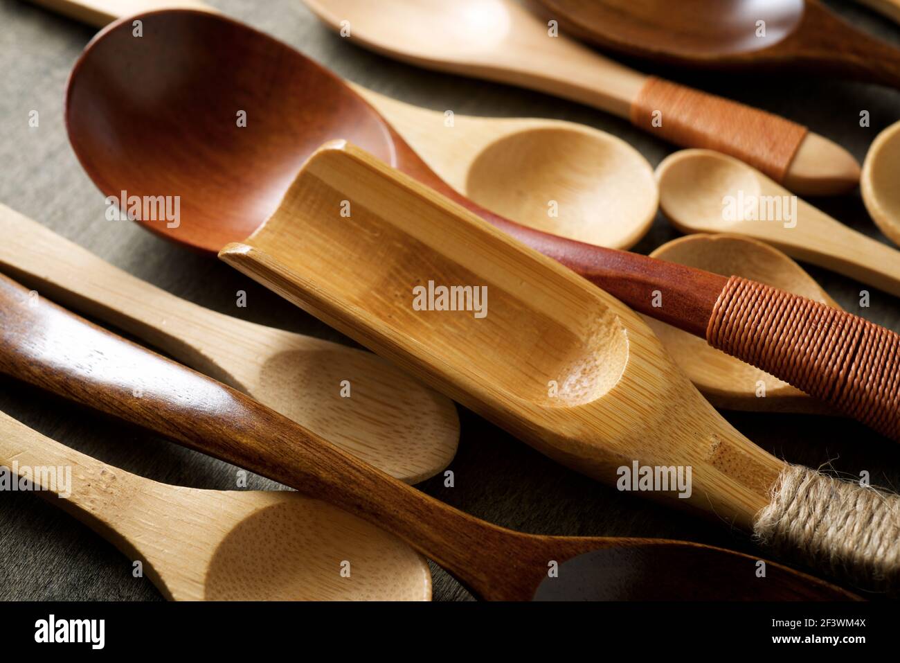 Collection of spoons on a wood table Stock Photo - Alamy