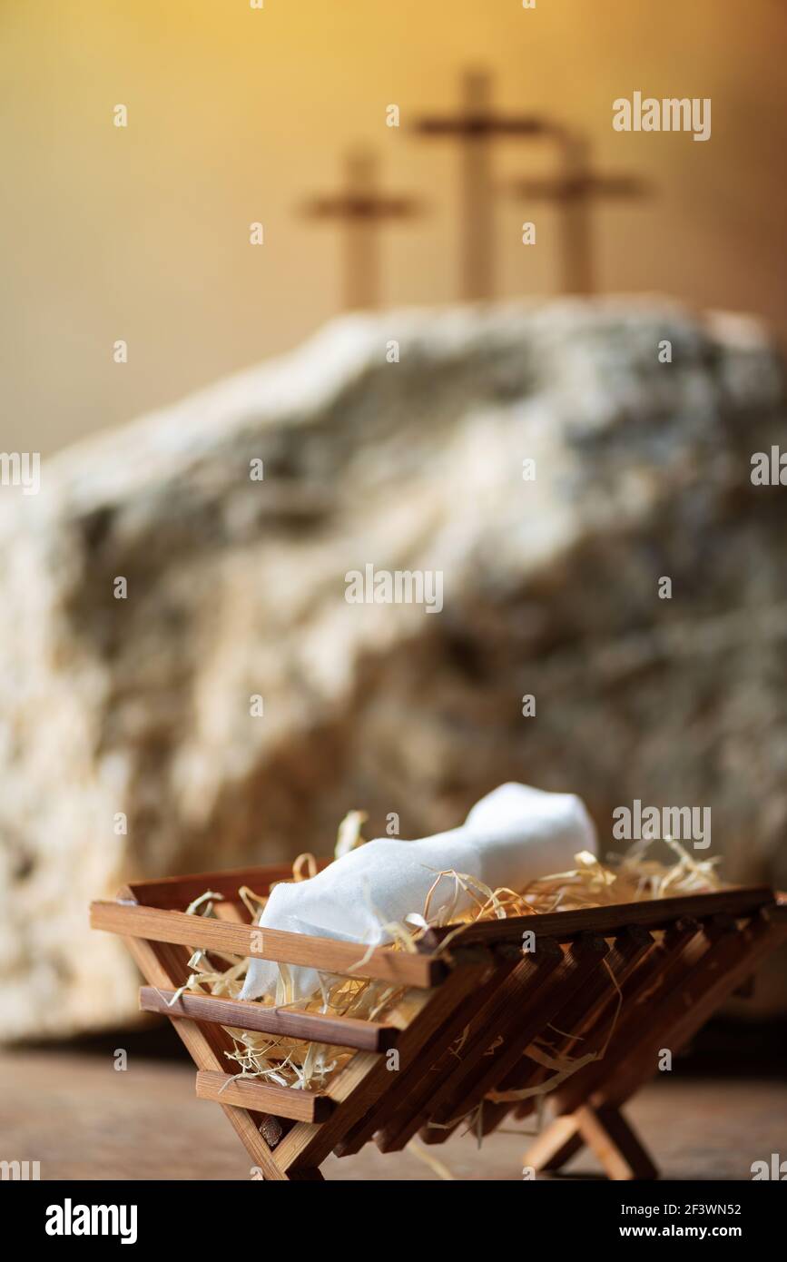 Wooden manger, three crosses background. Jesus - reason for season ...