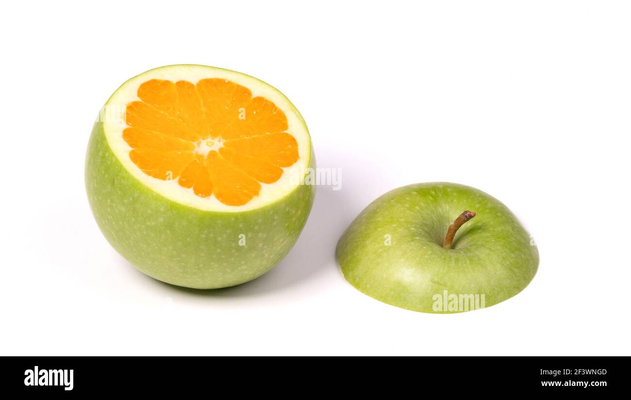 Green apple with orange inside, isolated on white Stock Photo - Alamy