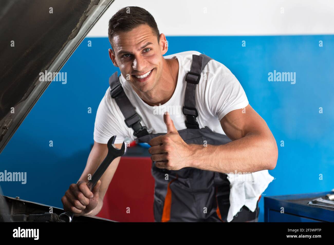 successful repair of car in a work station Stock Photo - Alamy