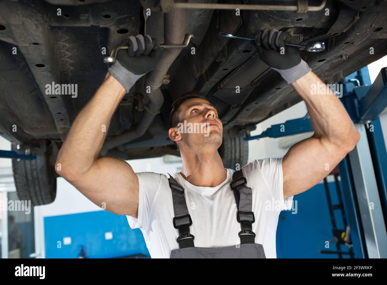 Strong hands mechanic holding hi-res stock photography and images - Alamy