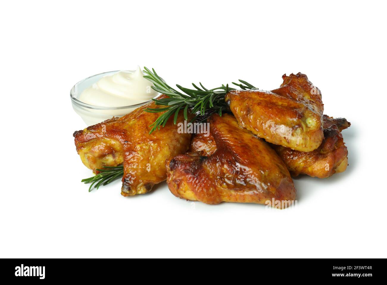 Baked chicken wings with rosemary and sauce isolated on white ...