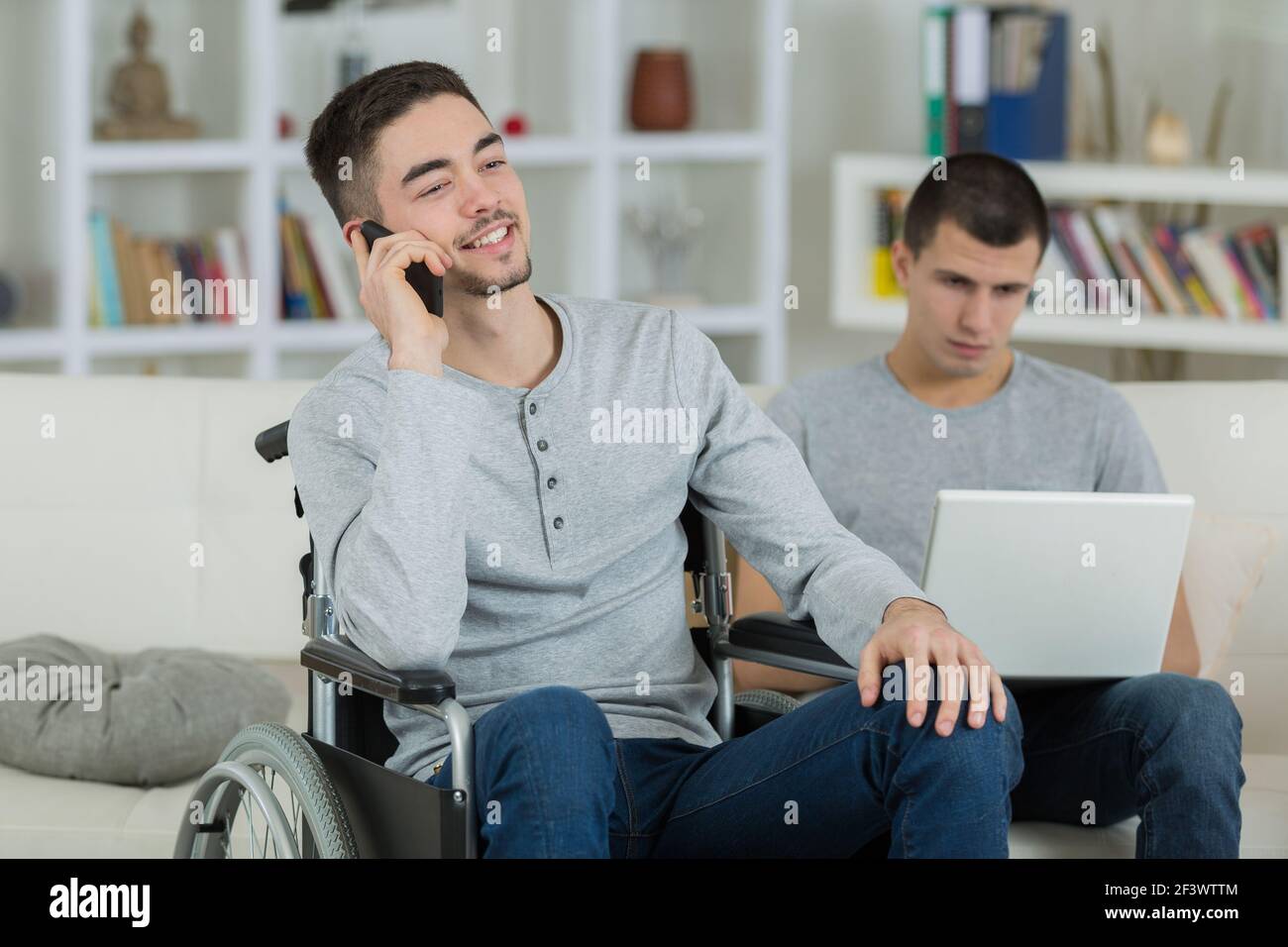 handicapped man sitting in the wheelchair Stock Photo - Alamy