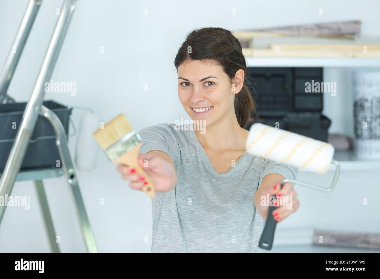 Close up paint roller rolling hi-res stock photography and images - Alamy