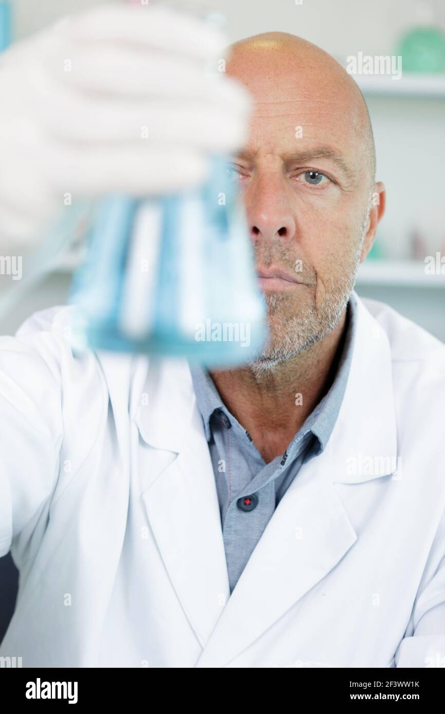 Laboratory with vials and scientists hi-res stock photography and ...