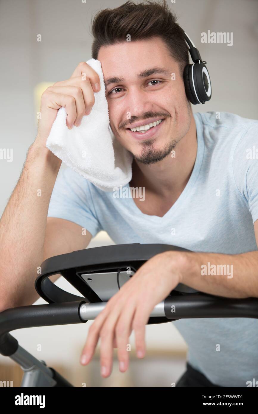 happy young tired and sweaty boy at the gym Stock Photo - Alamy