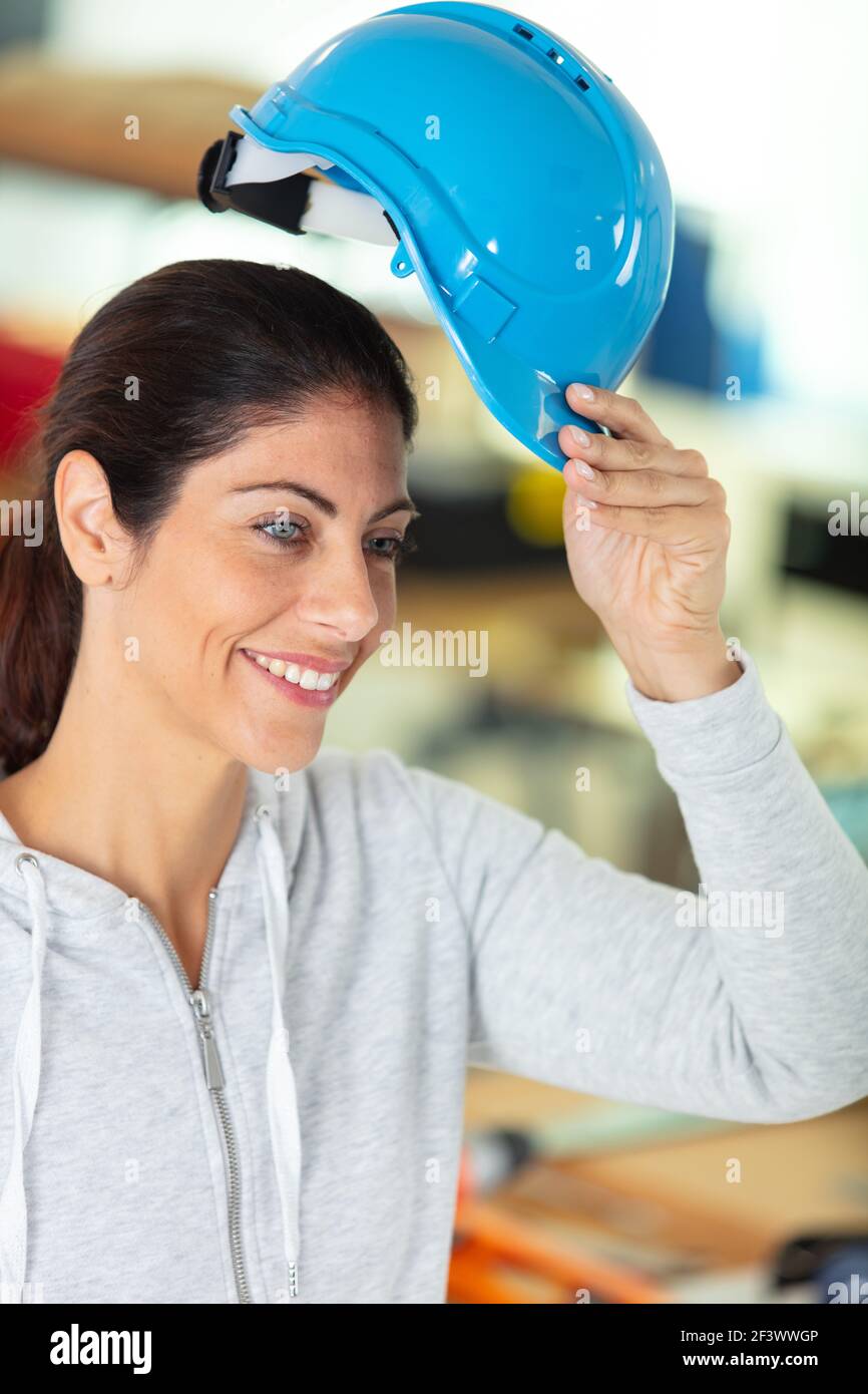 Female builder fixing electricity hi-res stock photography and images ...