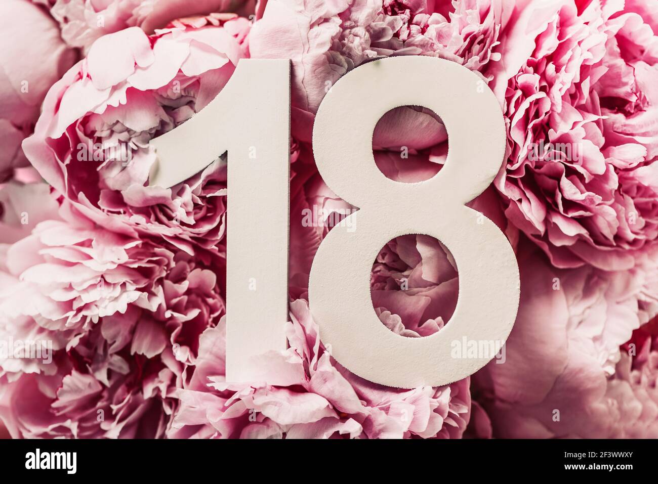 Creative layout. Peony flowers, digit eighteen. Birthday greeting card ...