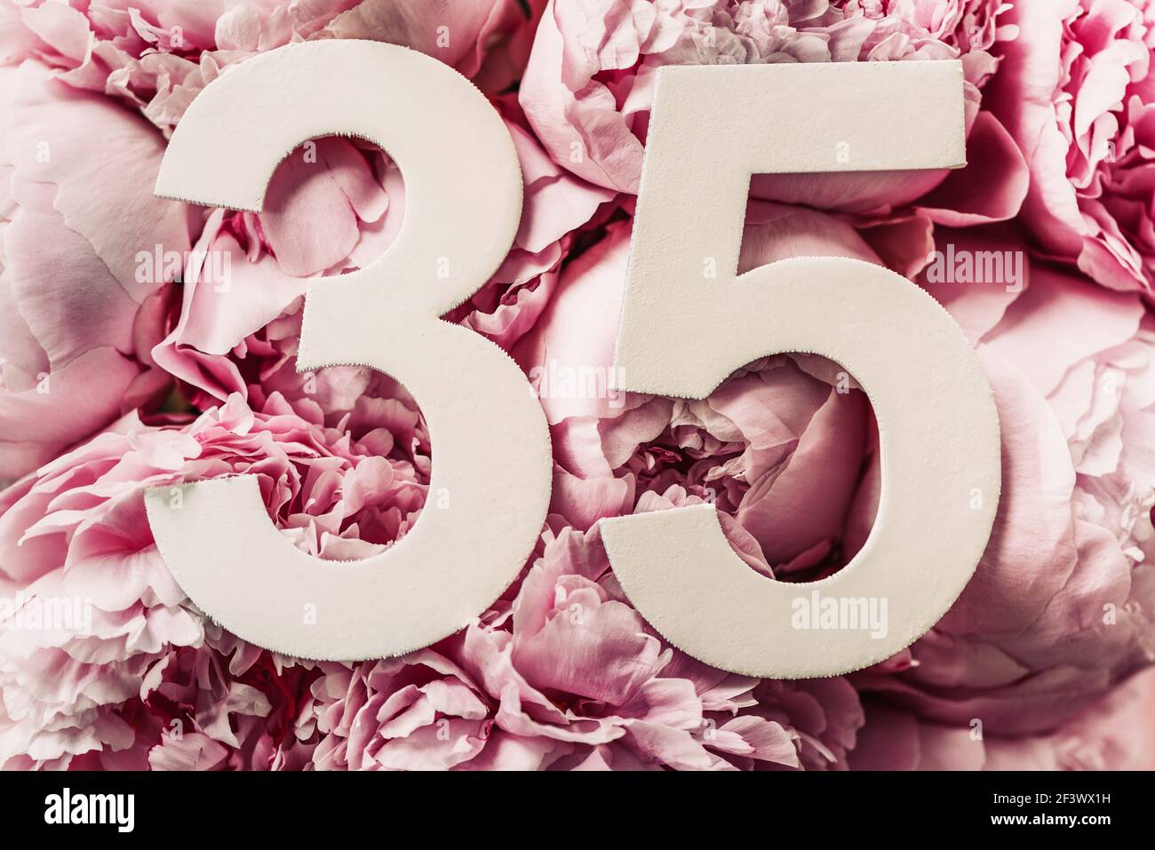 Peony flowers, digit thirty-five. Birthday greeting card with ...