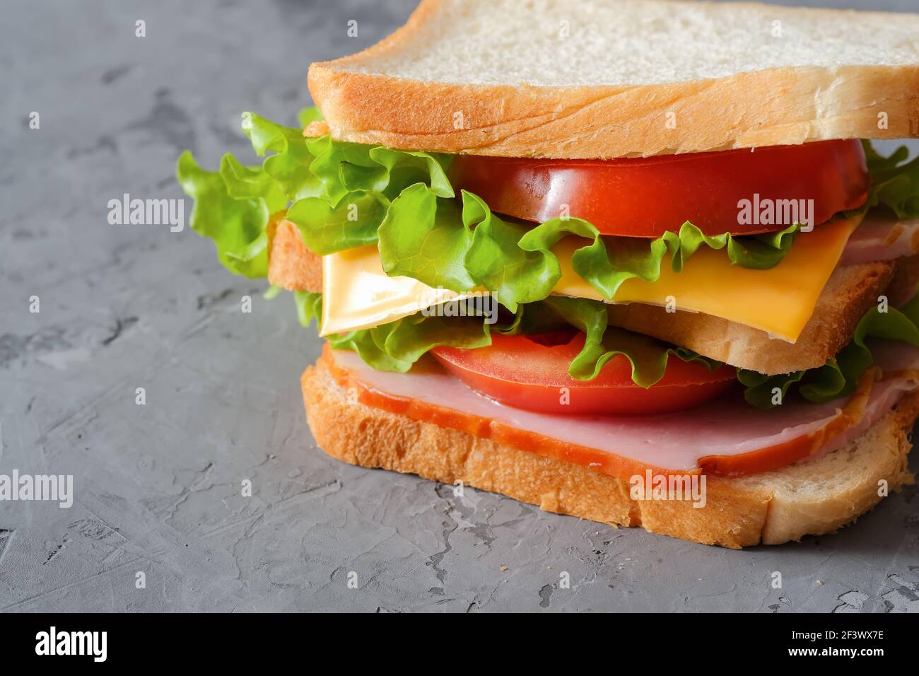 Big sandwich ham cheese lettuce tomato hi-res stock photography and ...