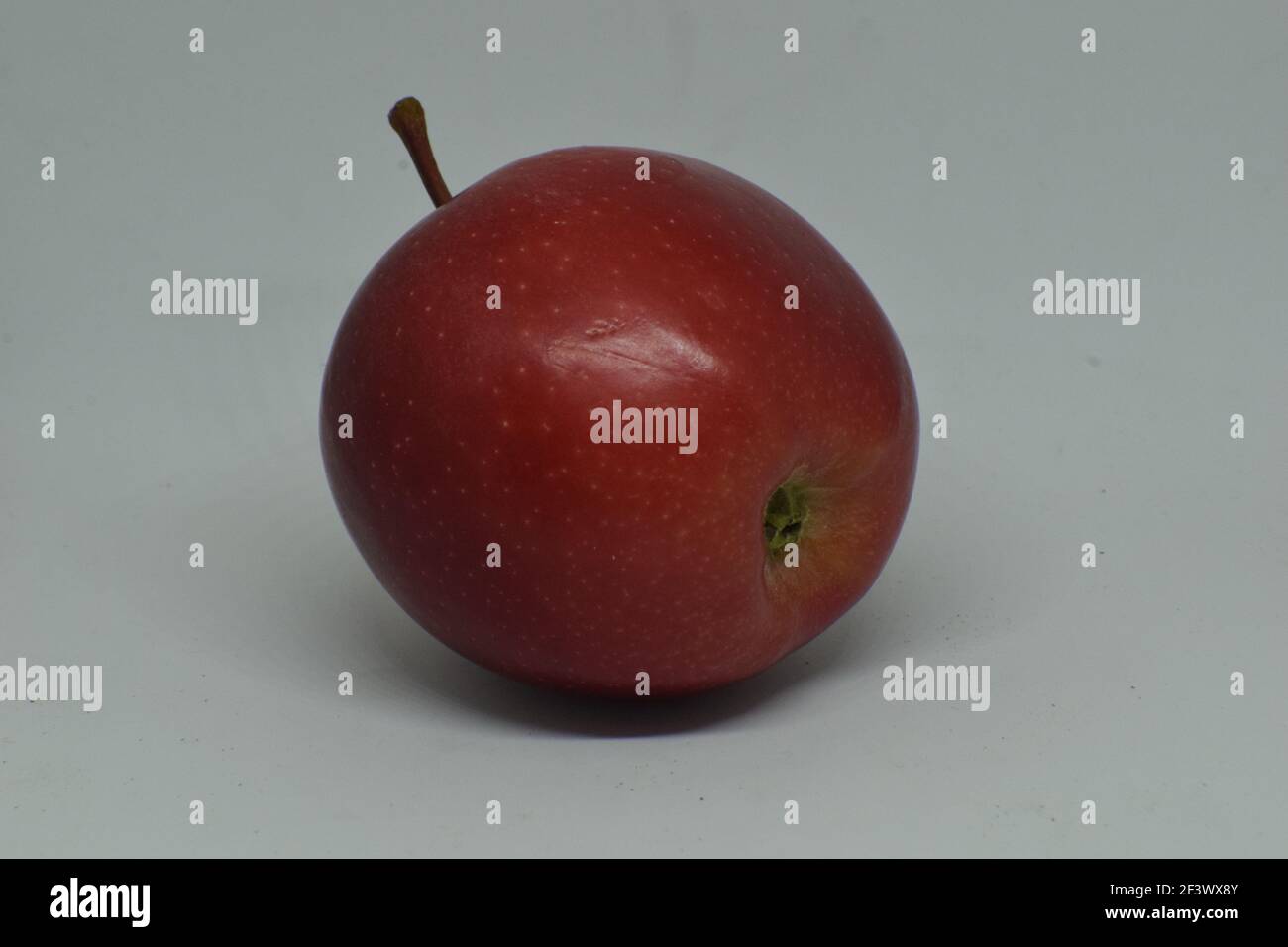 Apple on plain background hi-res stock photography and images - Alamy
