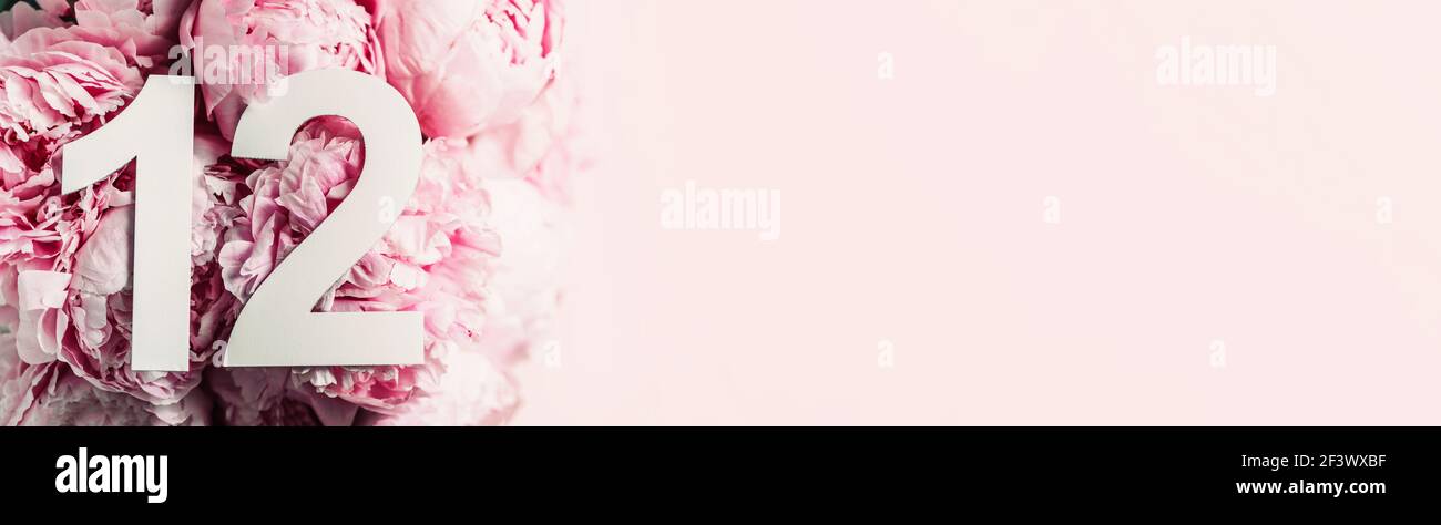 Creative layout. Peony flowers, digit twelve. Birthday greeting card ...