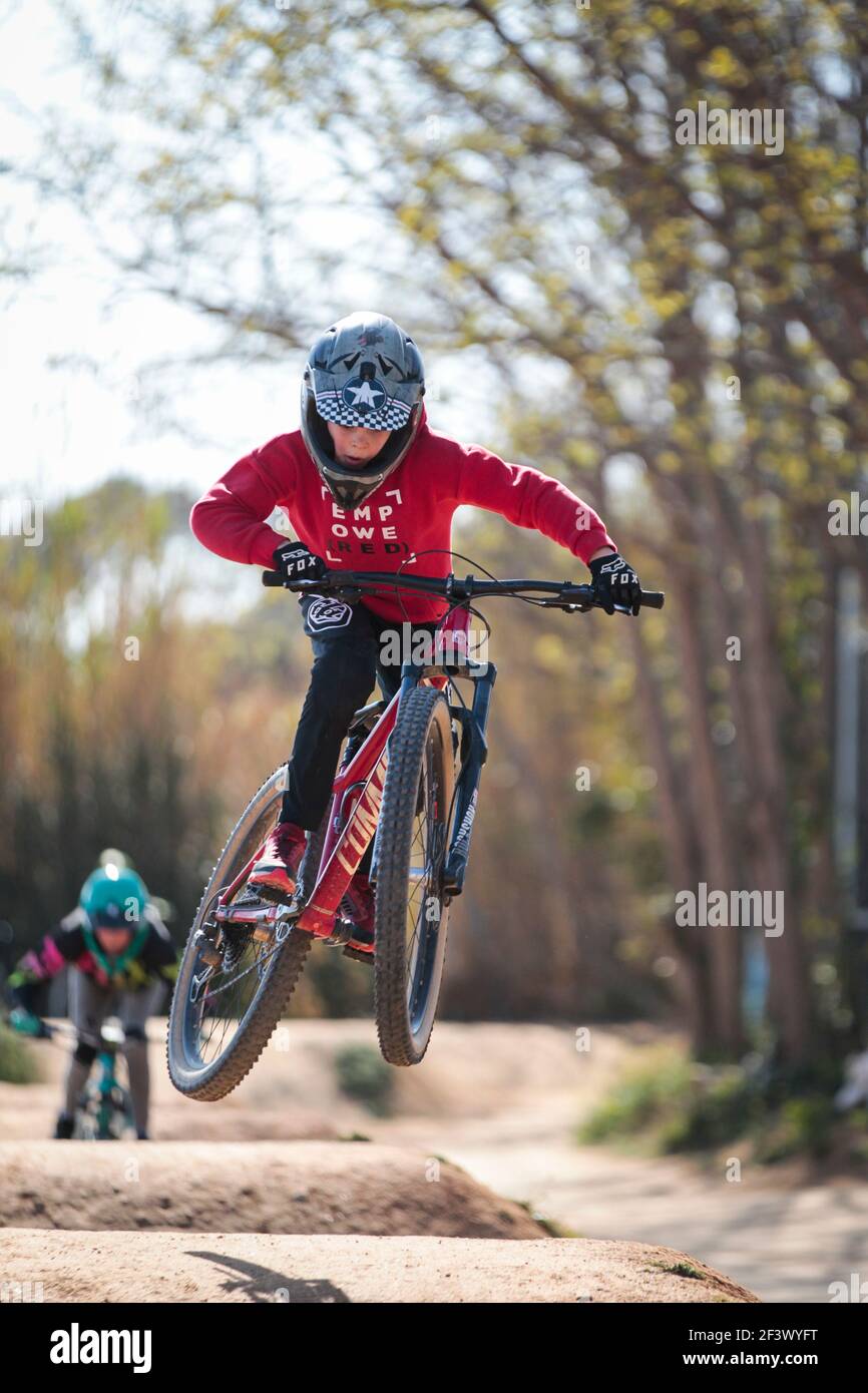 Mountain bike rider performing dirt jumps at La Poma Bike Park near ...