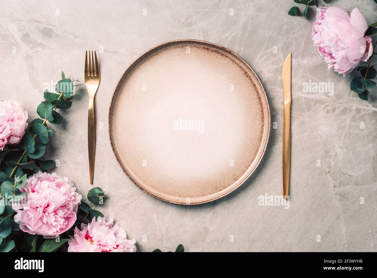 Tableware, flowers for serving a festive table, dinner. Stoneware ...