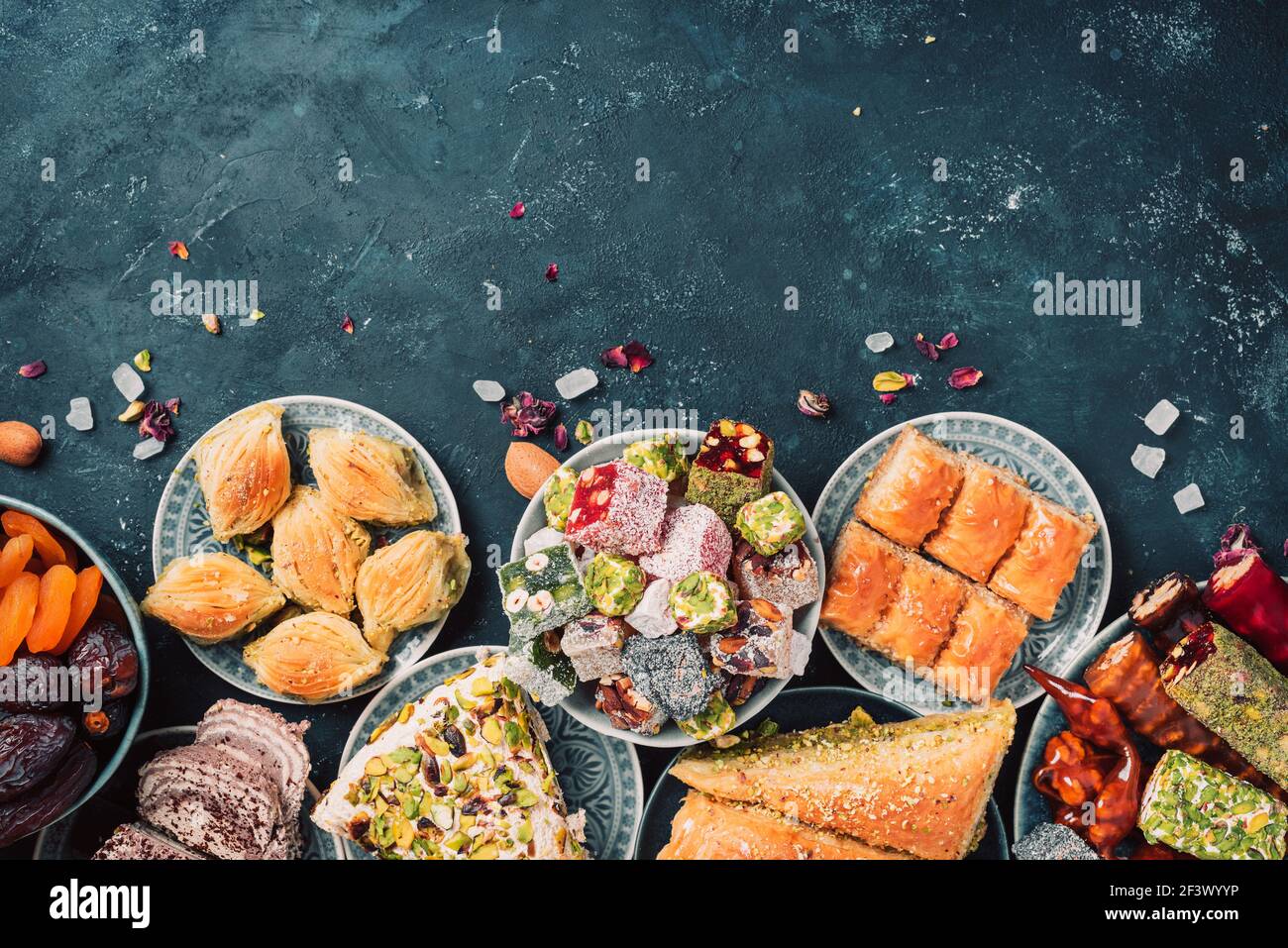 Traditional turkish delight on dark background. Top view. Flat lay ...
