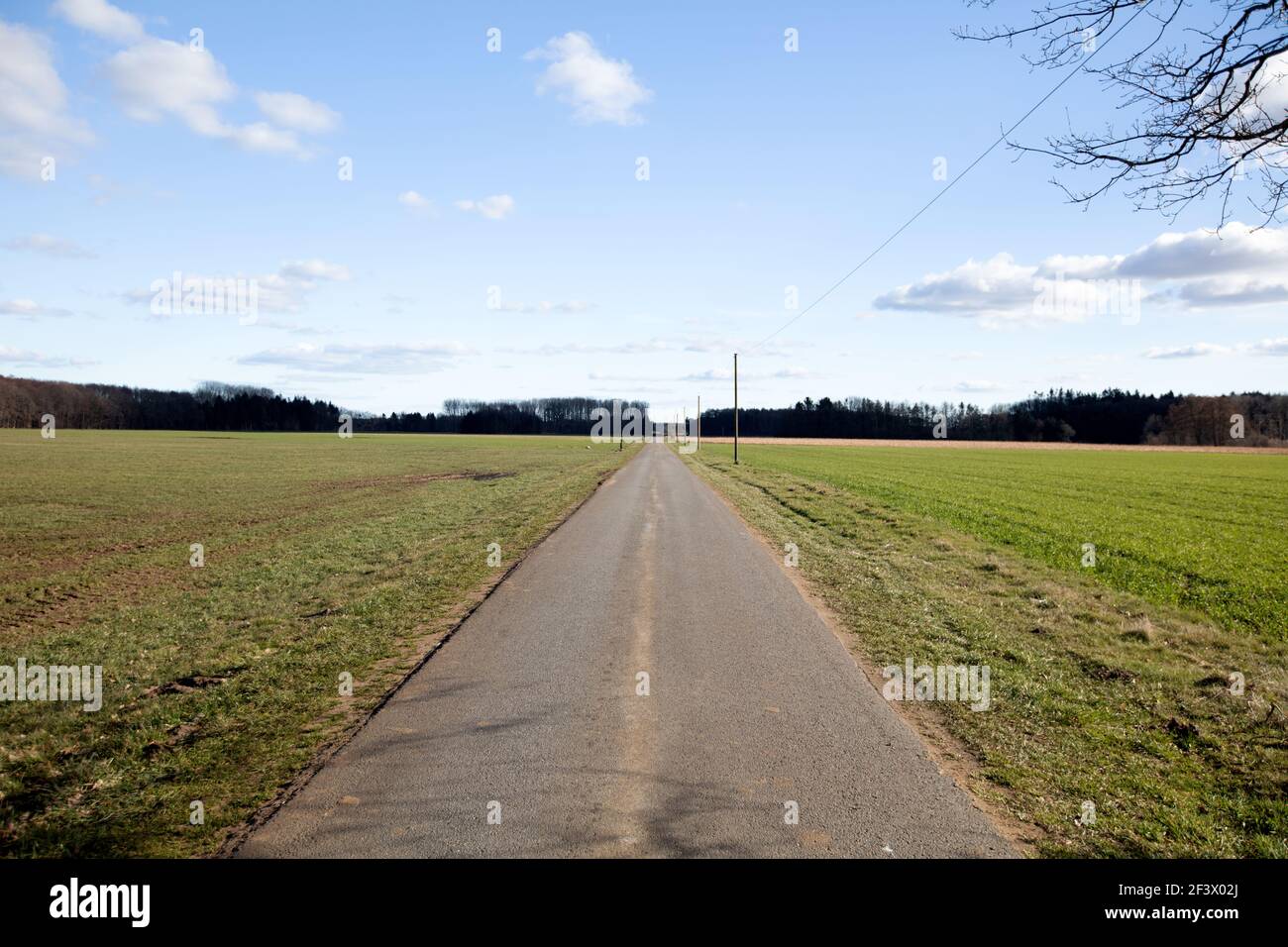 An emty road in rural landscape Stock Photo - Alamy