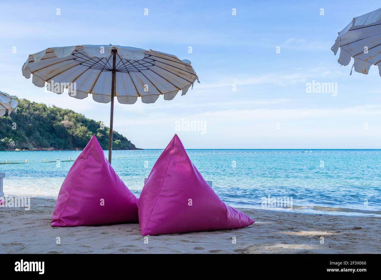 Pink inflatable sofa on the beach Stock Photo - Alamy