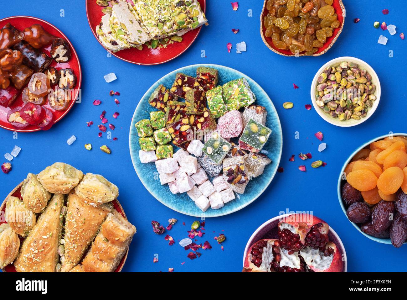 Traditional turkish delight on blue background. Top view. Flat lay ...