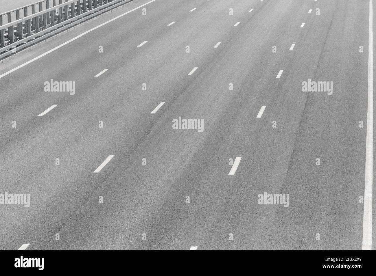 new marking on the asphalted highway Stock Photo - Alamy