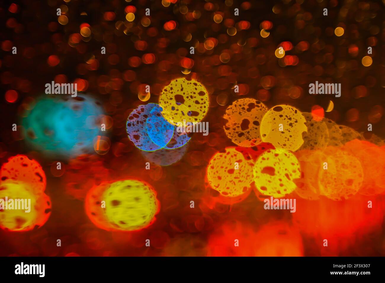 color round bright light spots on abstract background Stock Photo - Alamy