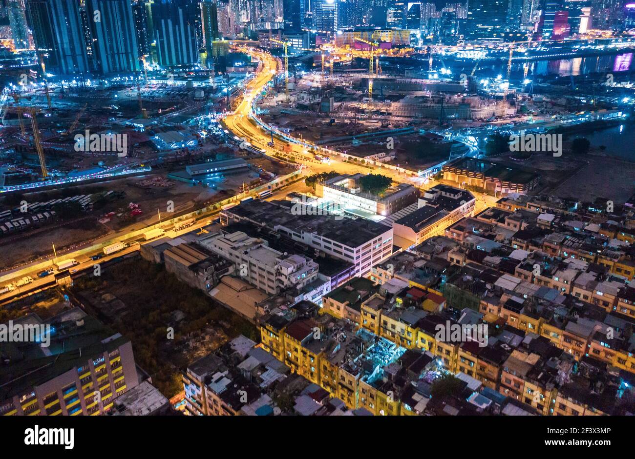 Epic aerial night view of downtown district in Kowloon, Hong Kong ...