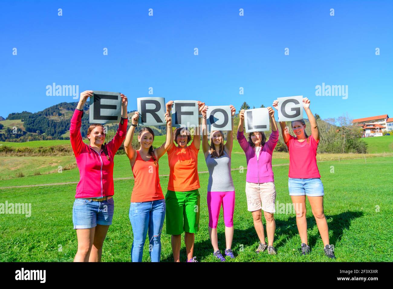 Motivational training in the Allgäu mountains, a group of young people ...