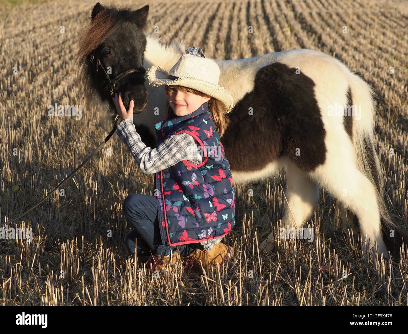 Cute child pony hi-res stock photography and images - Alamy