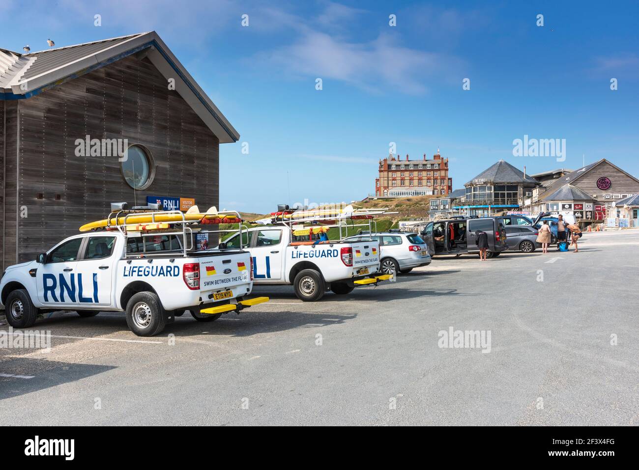 RNLI emergency response vehicles parked in Fistral car park in Newquay ...
