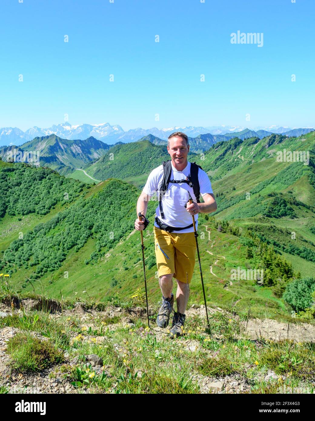 Man hiking in alpine region in austrian alps Stock Photo - Alamy