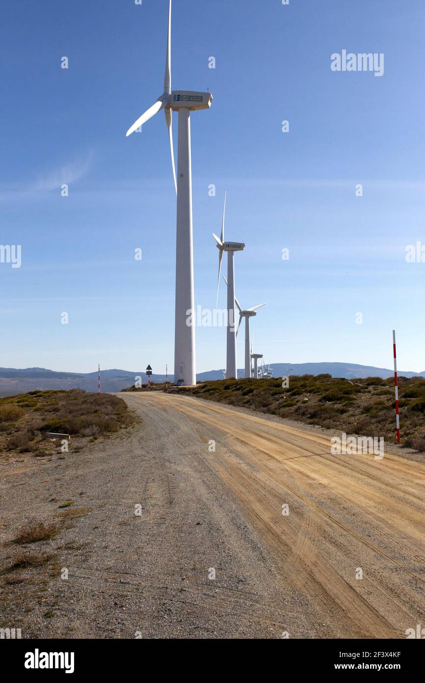 wind turbines producing electricity on a mountain divide in a strong ...