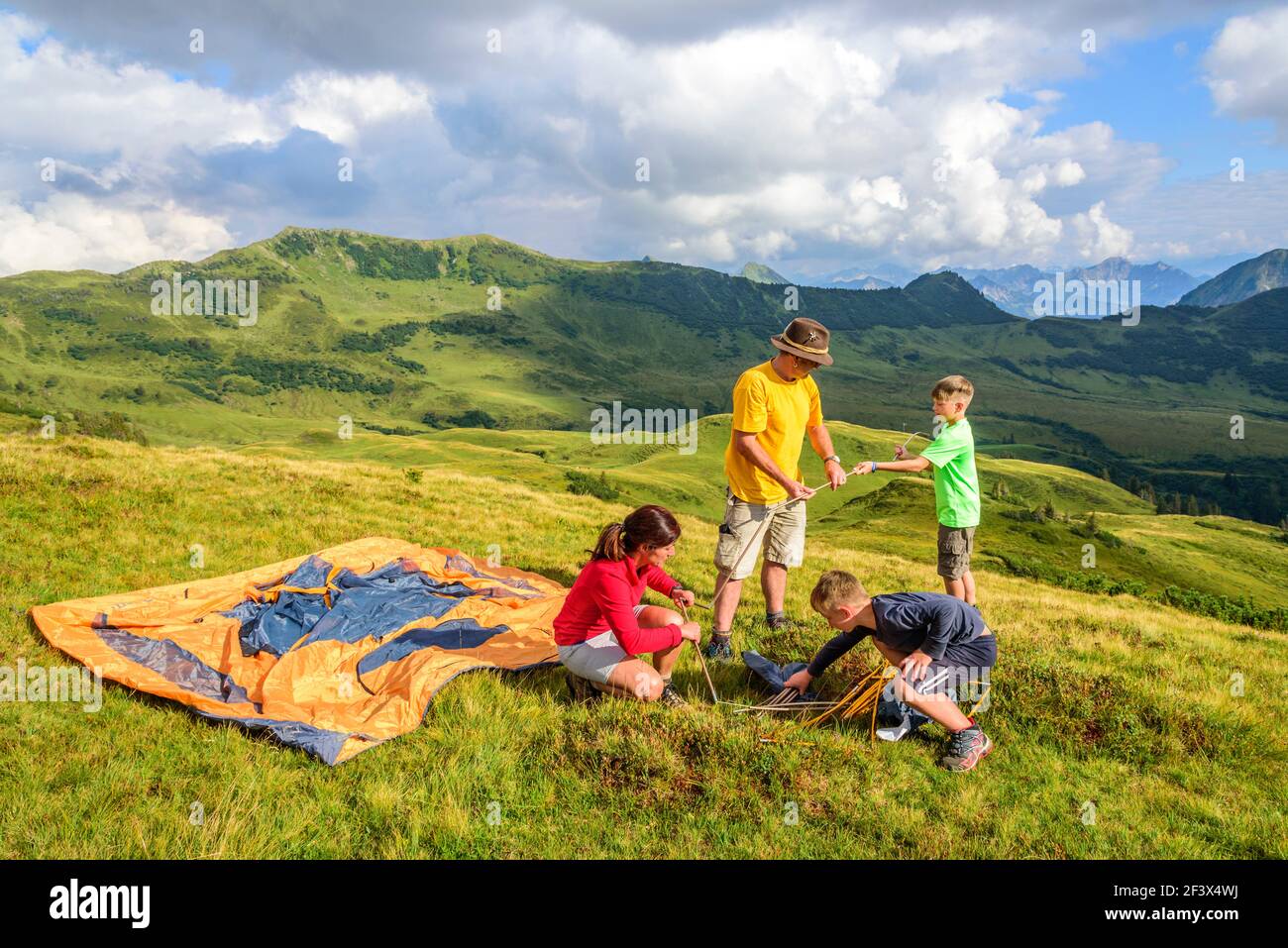 Tent setup for an overnight stay in the mountains Stock Photo - Alamy