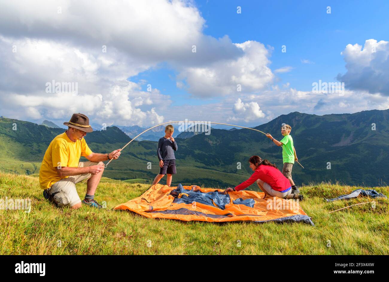 Tent setup for an overnight stay in the mountains Stock Photo - Alamy