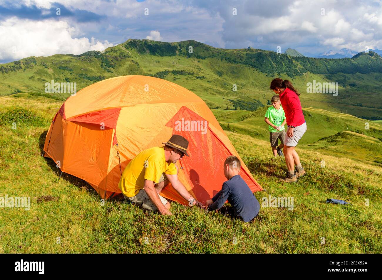 Tent setup for an overnight stay in the mountains Stock Photo - Alamy