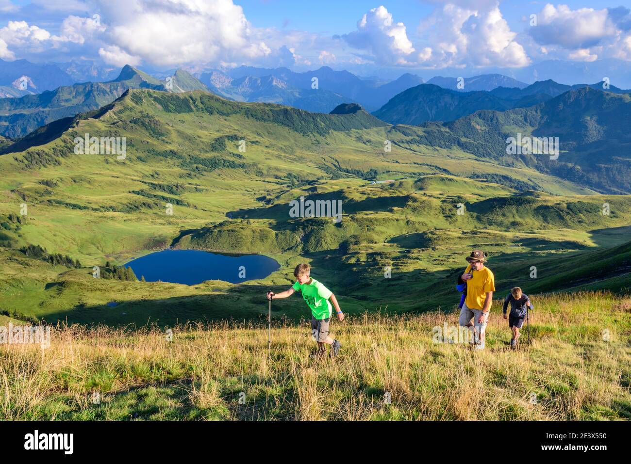 Active family hiking in high alpine region in austrian alps Stock Photo ...