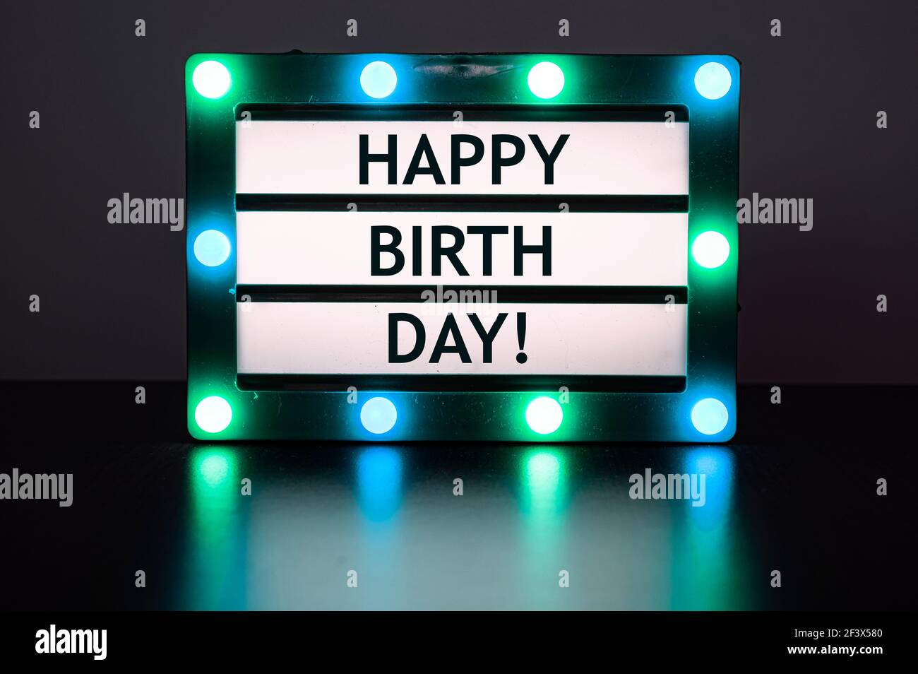 Lightbox with green and blue lights with words - Happy Birthday! Stock ...