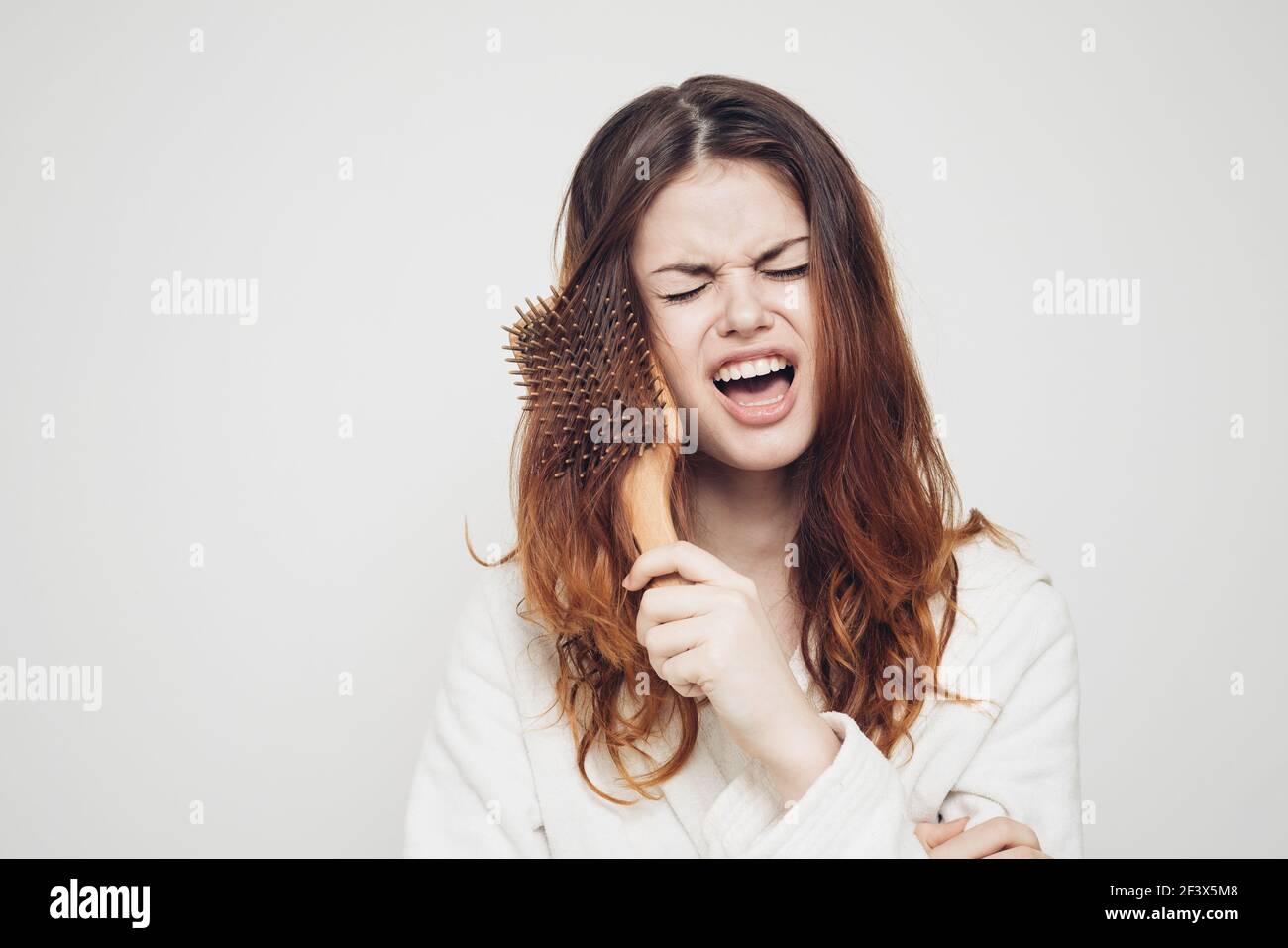 Woman tangled hair stuck hi-res stock photography and images - Alamy