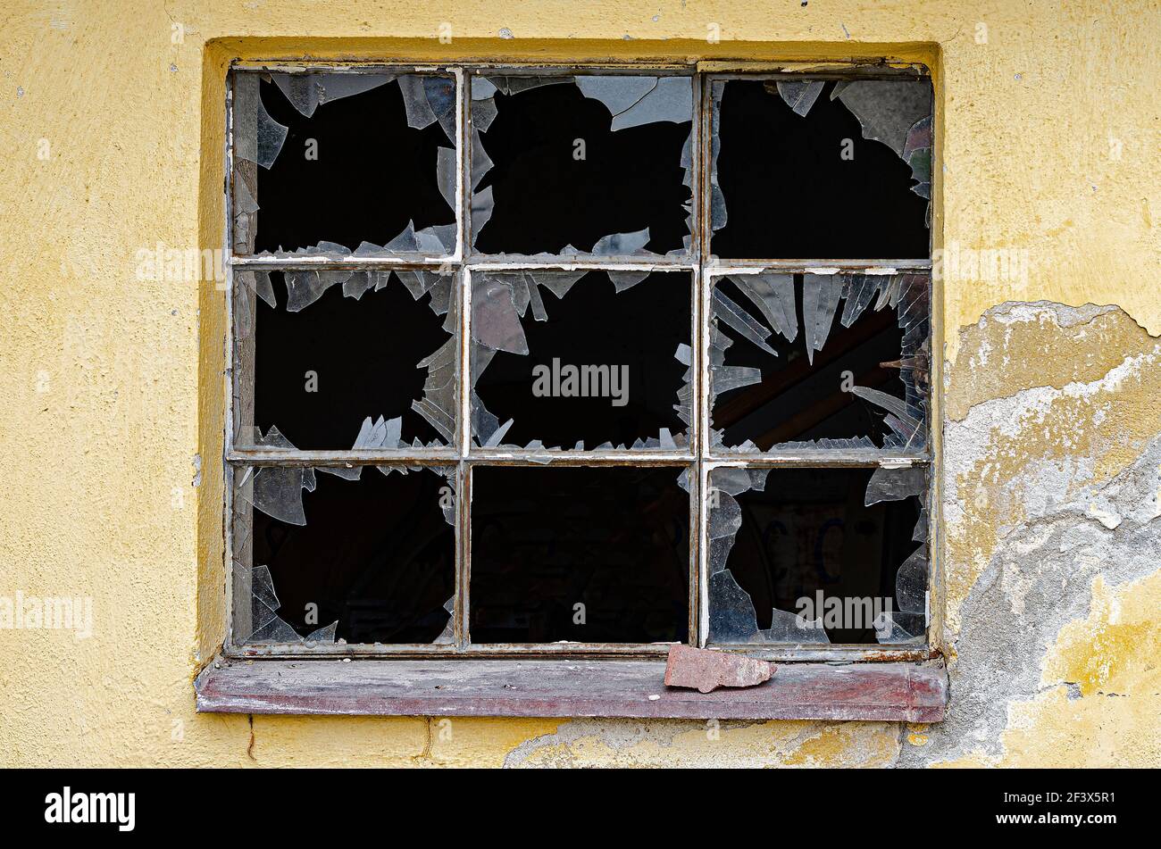 Old factory window with broken glass and rusty iron frame Stock Photo ...
