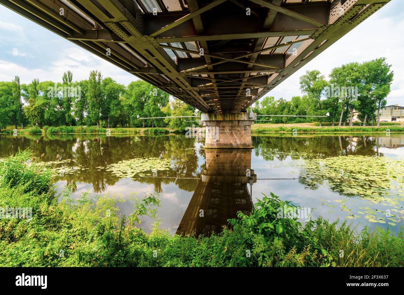 Metal railway bridge (bottom view) spanning the River Labe in Nymburk ...