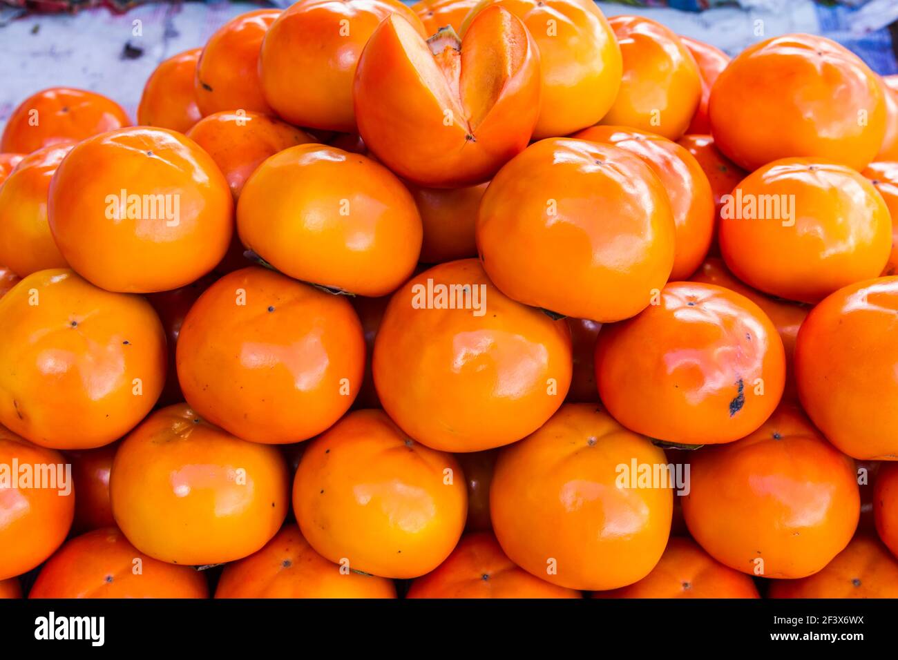 Close up of persimmons hi-res stock photography and images - Alamy